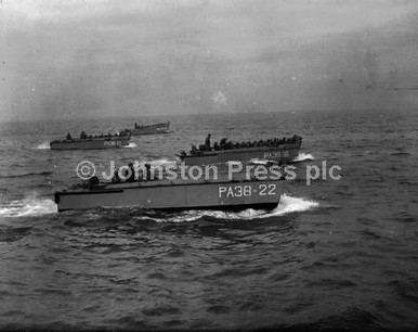20864264-Exercise Mainbrace - A wave of invasion barges for the shore ...
