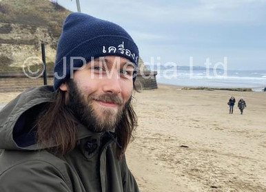 39363759-Nathan Rowland Takes in the clear view over the North Sea from ...
