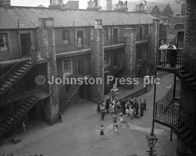 20875072-Councillors Pat Rogan and Norman McQueen visit the houses in ...