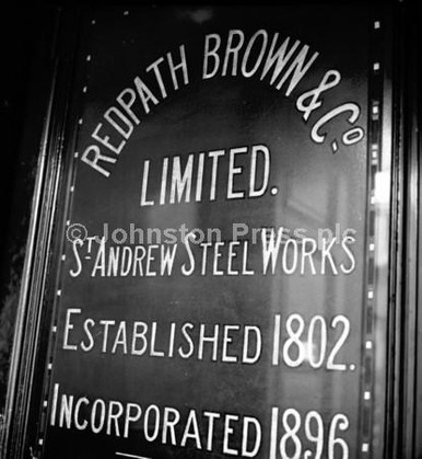 20367725-Sign at the Redpath Brown & Co Ltd other sign says Redpath ...