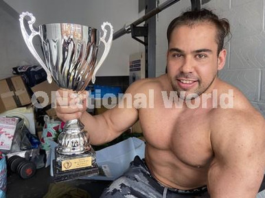 39498416-Adam Foster with his Mr Britain Bodybuilding contest winning ...