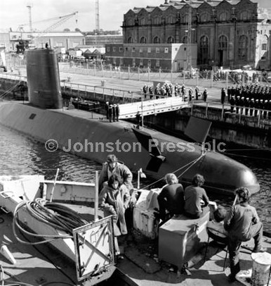 20234704-Dockyard workers get a good view of the ceremony when nuclear ...