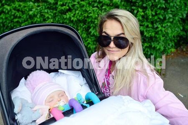 39473092-Grace Ashley with her daughter Lydia enjoying a stroll around ...