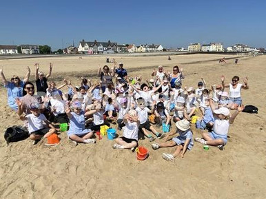 39490109-Eldon Grove Academy pupils and staff wave for the camera ...