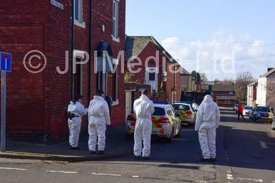 39369031-Police Officers and forensics in Marshall Wallis Street on ...