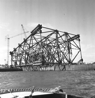 20240764-An oil production platform jacket is loaded onto a barge at ...