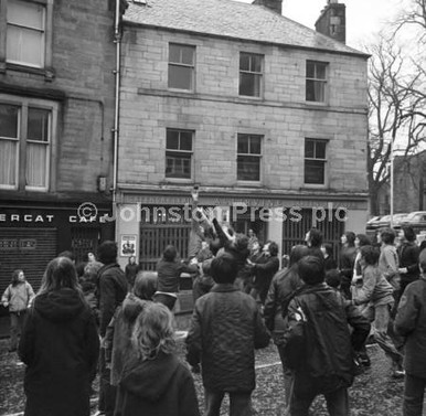 20241147-The Jedburgh street game Jethart Hand Ba being played in ...