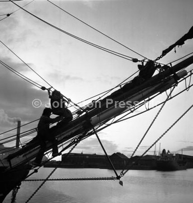 20241921-One of the hands climbs the rigging on the Charlotte Rhodes ...