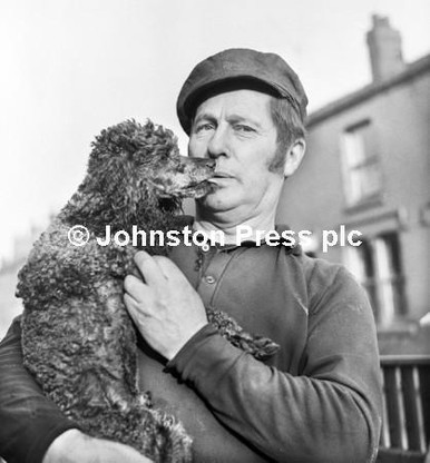 35945216-A local resident with his best pal in Chapel Street, Lower ...