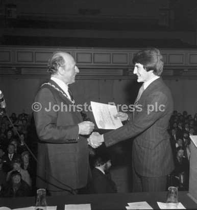 20243905-Scottish rugby player Andy Irvine receives his Royal ...