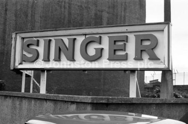 20244292-The sign outside the Singer sewing machine factory in ...