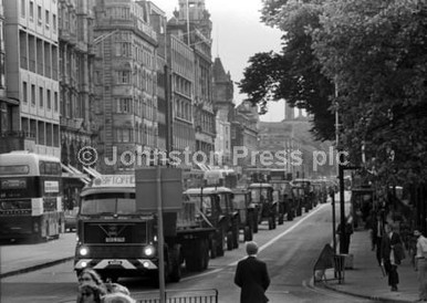 20244295-Farmers drove thirty tractors from Torness through the centre ...
