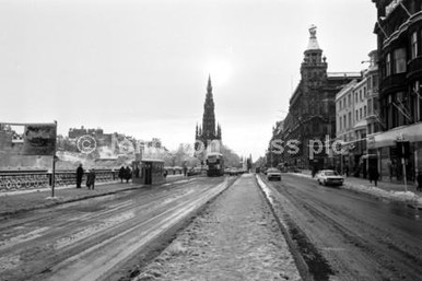 20325542-Roads and pavements in Princes Street Edinburgh are almost ...