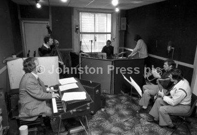 20325991-The Jimmy Deuchar Quintet during a recodring session at the ...