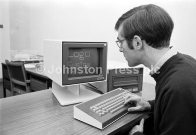 20328001-Dr Andy Russell operates the ultra-modern Terak micro-computer ...