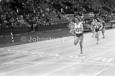 22561403-Athlete Margot Wells no 22 crosses the finishing line to win ...