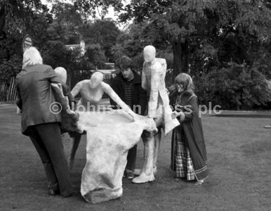 22561540-Sculptor Edith Simon helps place her life-sized group ...