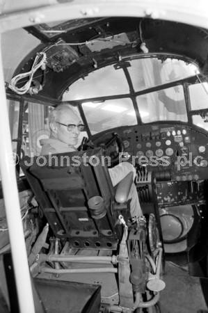 22562101-Unidentified man at the controls in the cockpit of a Lancaster ...