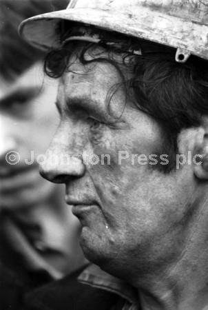 22619494-A miner talks to concerned relatives at the Cardowan colliery ...