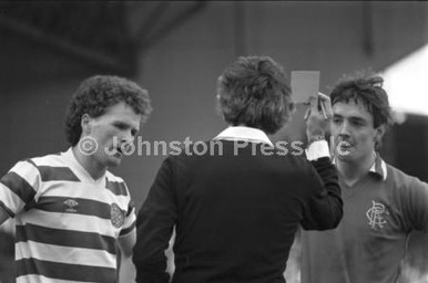 22619755-Celtic s Davie Provan perm and Rangers Ian Redford are shown ...
