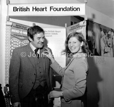 20364443-Scottish entertainer Jimmy Logan gets a badge at the British ...