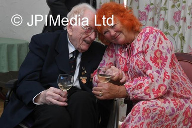 39592956-Photo Neil Cross; 104 year old Ernest Horsfall receiving a ...