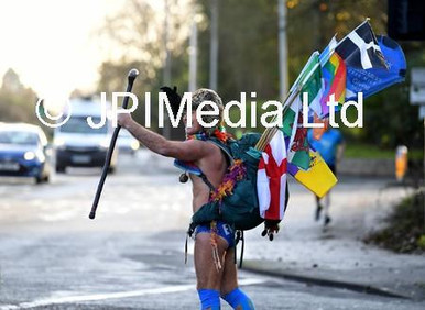 39297522-Photo Neil Cross; Speedo Mick walking through Preston on his ...