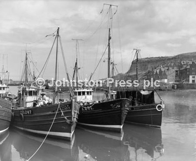 28211234-Whitby udated. Whitby Harbour Fishing fleet. Boats are: The ...