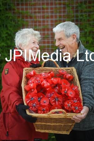 39211394-Leyland in Bloom are making poppies from plastic bottles ...