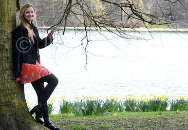 38937980-Cat Thomson from Leeds in Roundhay Park checking Tik Tok on ...