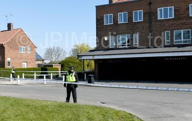 38947202-Police guard a cordon on Stanks Parade in Leeds - National ...