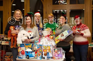 39291844-Cleckheaton Christmas Elves packing gift hampers for families ...