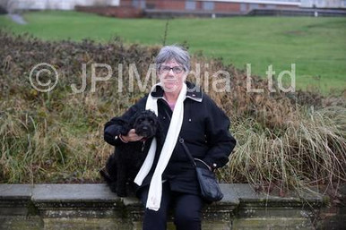 39286240-Out and about at Blyth Beach. Doreen Cole with her dog Ruby ...