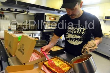 38920003-Detroit style pizza company named Midnight Pizza Cru ...