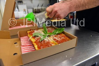 38920008-Detroit style pizza company named Midnight Pizza Cru. - Iconic ...