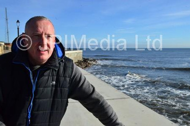 38926582-Stuart Allison stopping to take in the view over the North Sea ...