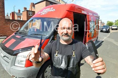 39002877-Ali Barber owner Ali Sezer with his new mobile barber van ...