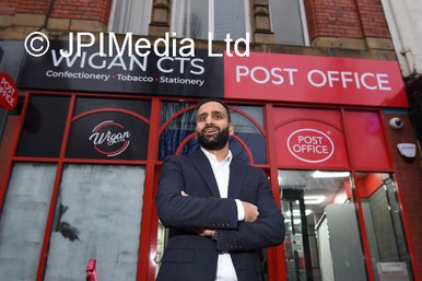 39621342-WIGAN - 30-11-22 Post Master Arif Matadar at the new permanent ...