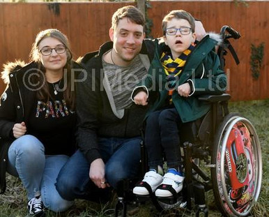 38872853-Ben Milner and Lora Bedford with their son Phoenix Milner 5 at ...