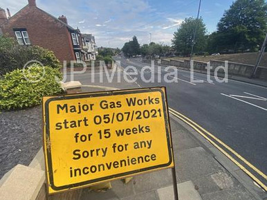 39036430-Signs warning of advanced road works in Hart Lane. Picture by ...