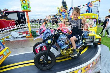 39068860-Corban Whitelock enjoying a ride on the motorbikes during the ...