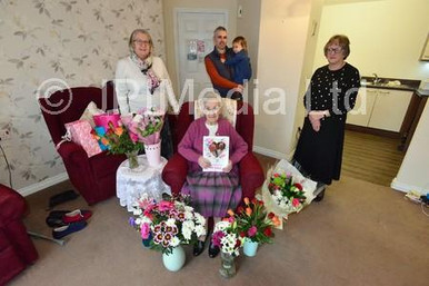 38869111-Nancy Rooks celebrating her 100th Birthday with rear left to ...