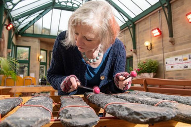 39621916-Bobbie Millar from Quarry Arts plays the Lithophone at Cliffe ...