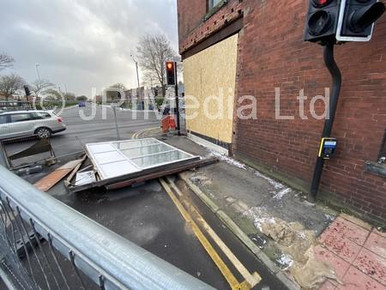 38895844-The scene where a shop front collapsed at the junction of Raby ...