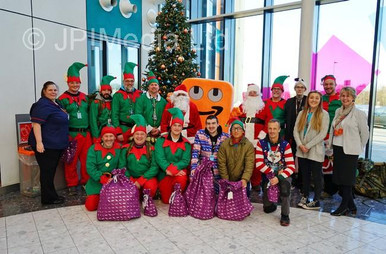 39624953-Amazon EMA2 present toys and chocolate to Leanne Minett ...