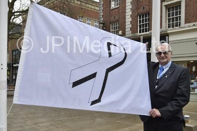 38841032-Cllr. John Holdich raising the White Ribbon flag outside the ...