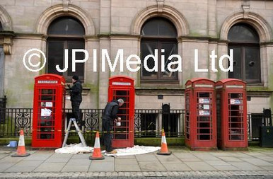 38597660-Photo Neil Cross A couple of the iconic telephone boxes in ...