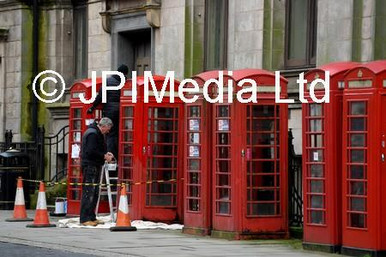 38597676-Photo Neil Cross A couple of the iconic telephone boxes in ...