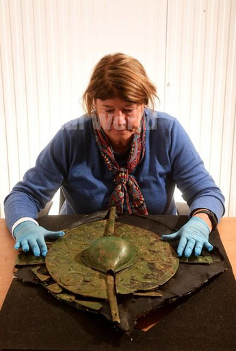 39658939-Archaeologist Paula Ware with the shield she dug up in ...