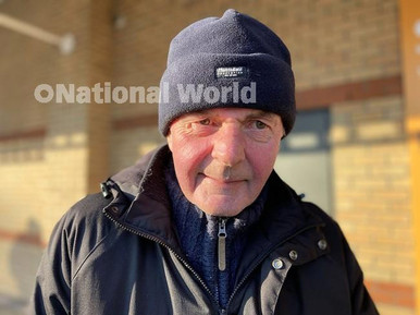 39661953-Looking serious Brian Godfrey has his picture taken as he ...